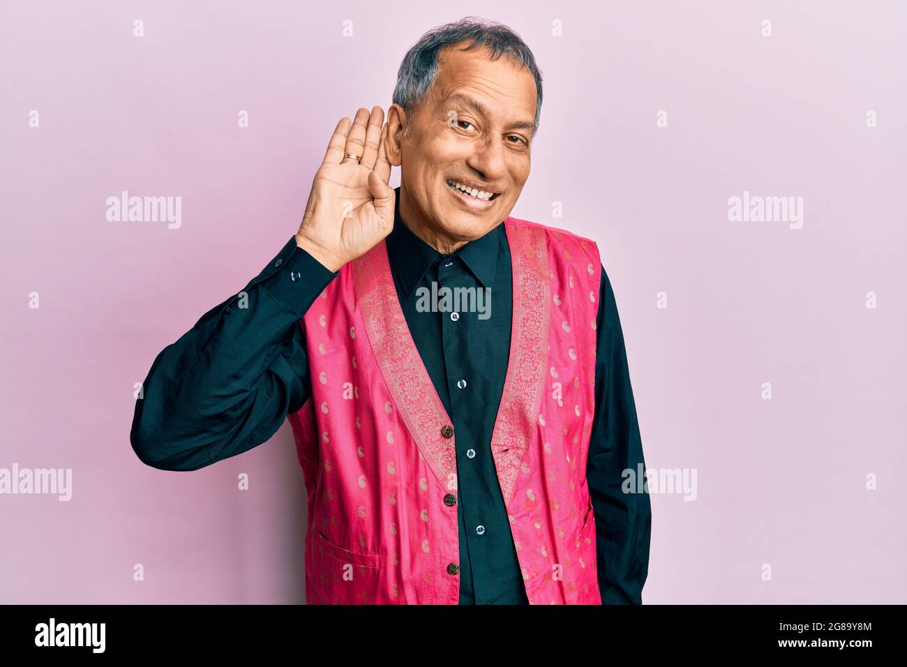 Middle age indian man wearing traditional indian clothes smiling with ...
