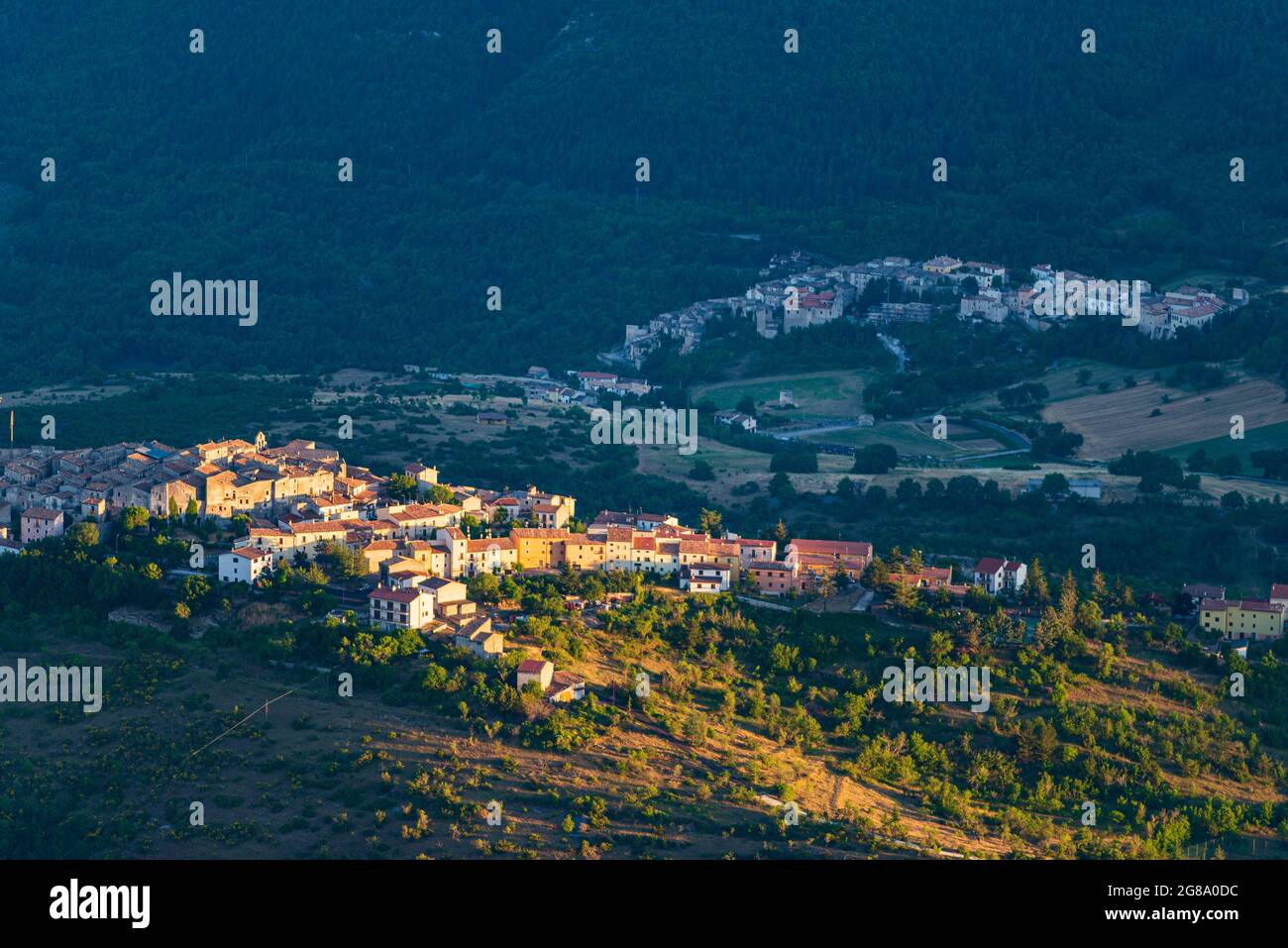 Sunset over medieval village perched on hill top, Abruzzo, Italy. Gran ...