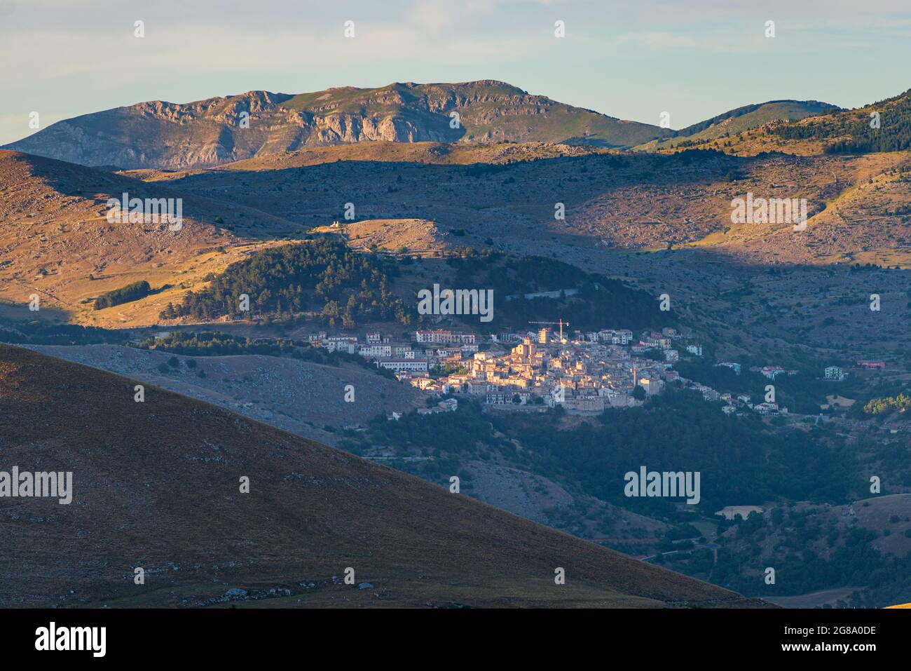 Sunset over medieval village perched on hill top, Abruzzo, Italy. Gran ...