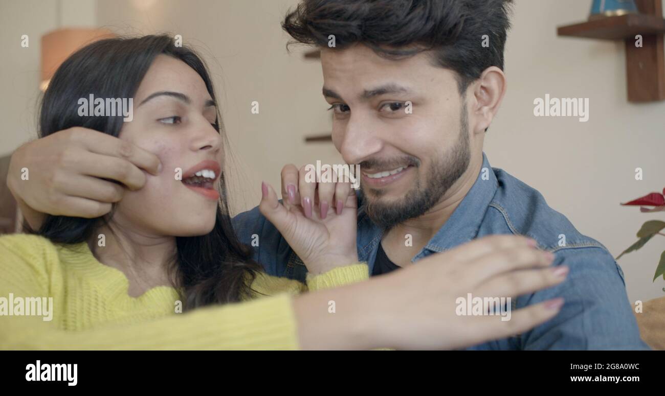 Pinching cheeks hi-res stock photography and images - Alamy