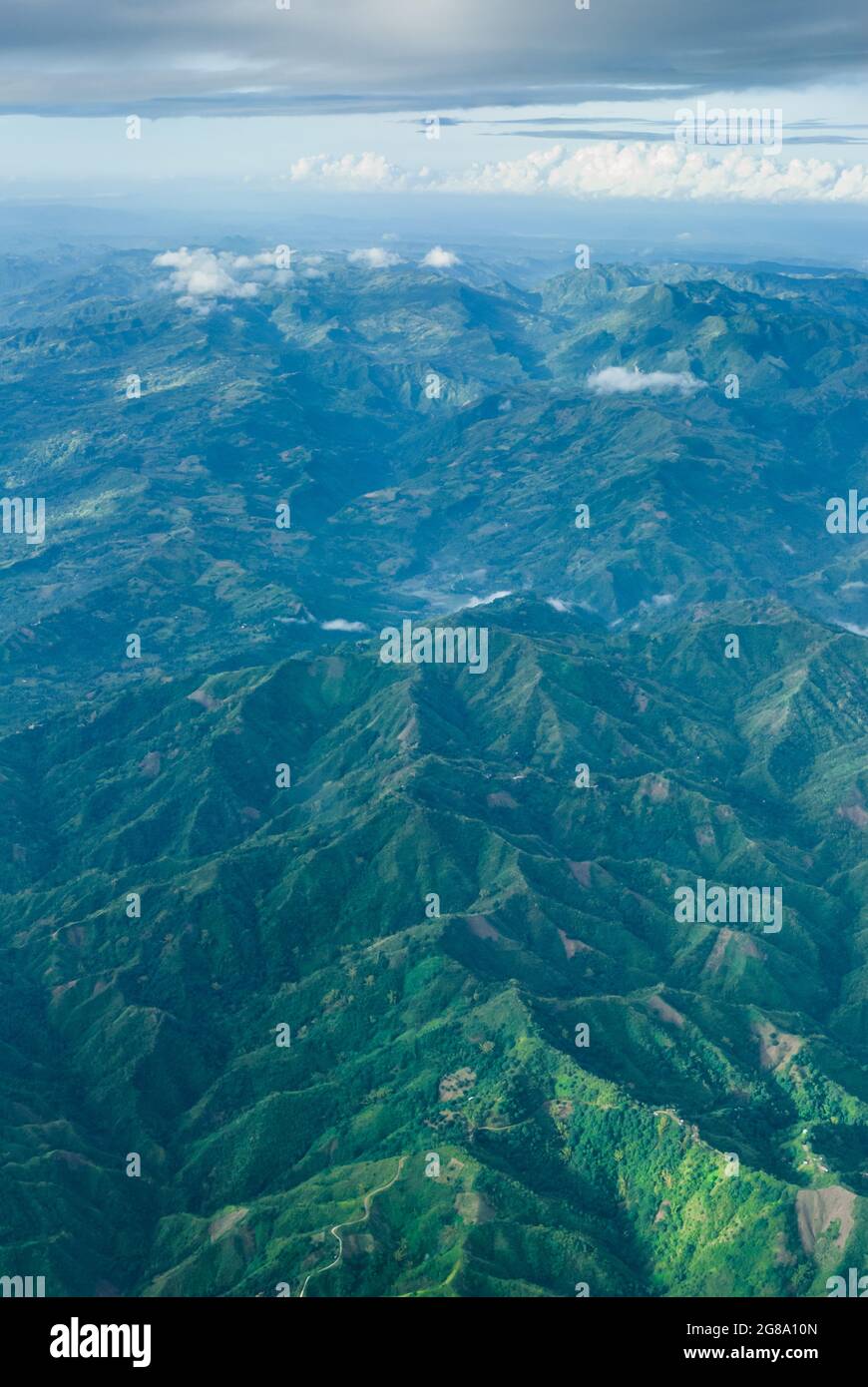 Aerial view of the mountains range from the airplane Stock Photo - Alamy