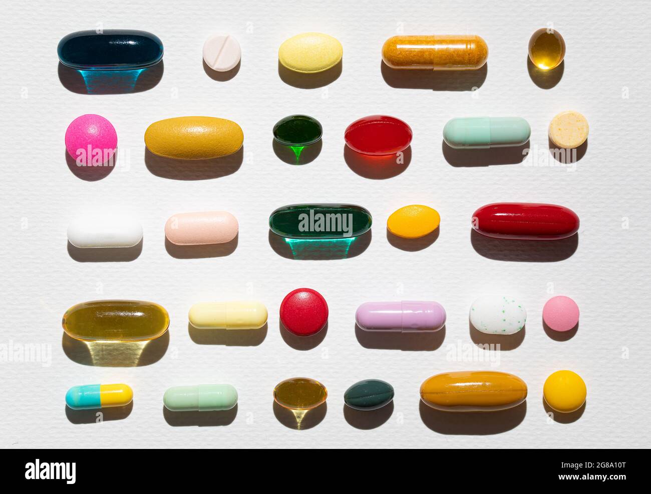 Group of assorted pharmaceutical medicine pills, colorful tablets and ...