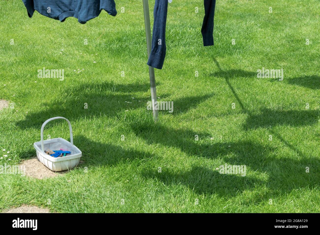 Washing clothes shadow at the garden Stock Photo - Alamy