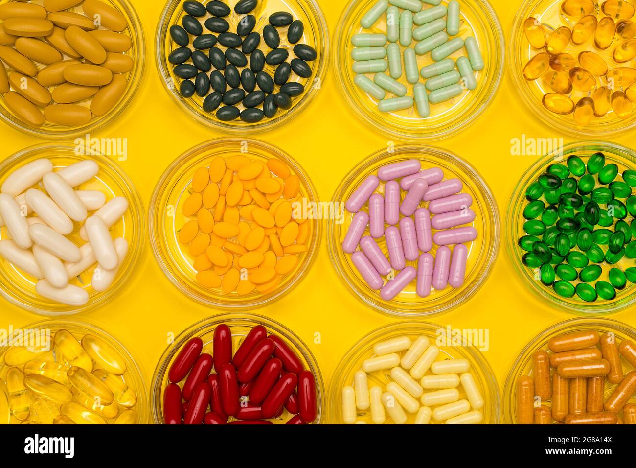 Assorted various kinds and many sizes of pills pharmaceutical in glass ...