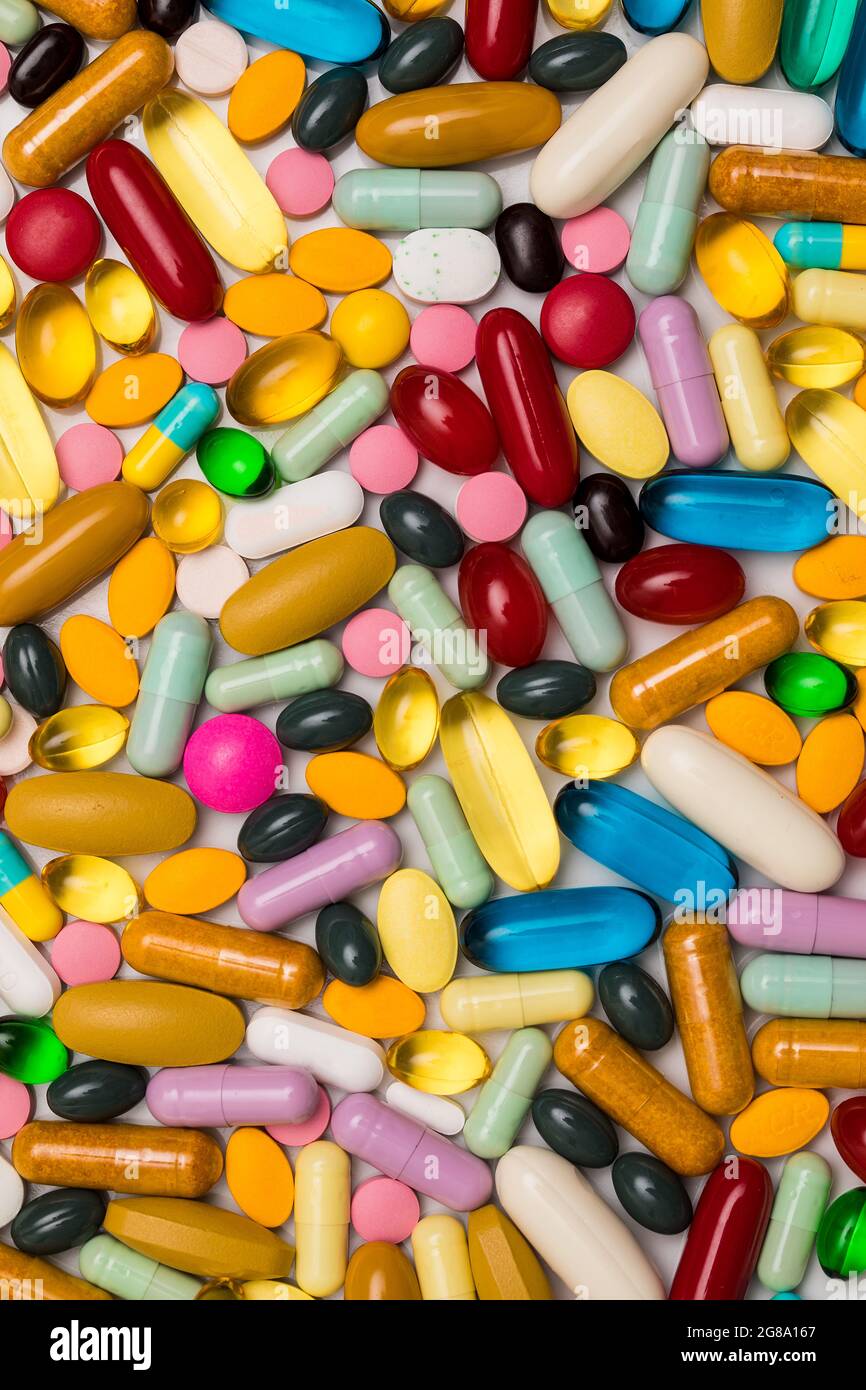 Group of assorted pharmaceutical medicine pills, colorful tablets and ...