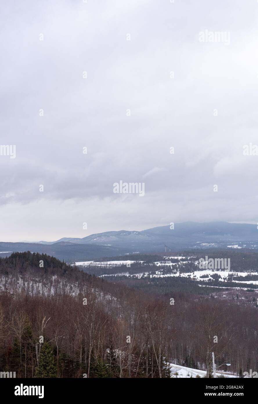 Landscape of Lake Placid New York in the winter. Rolling hills ...