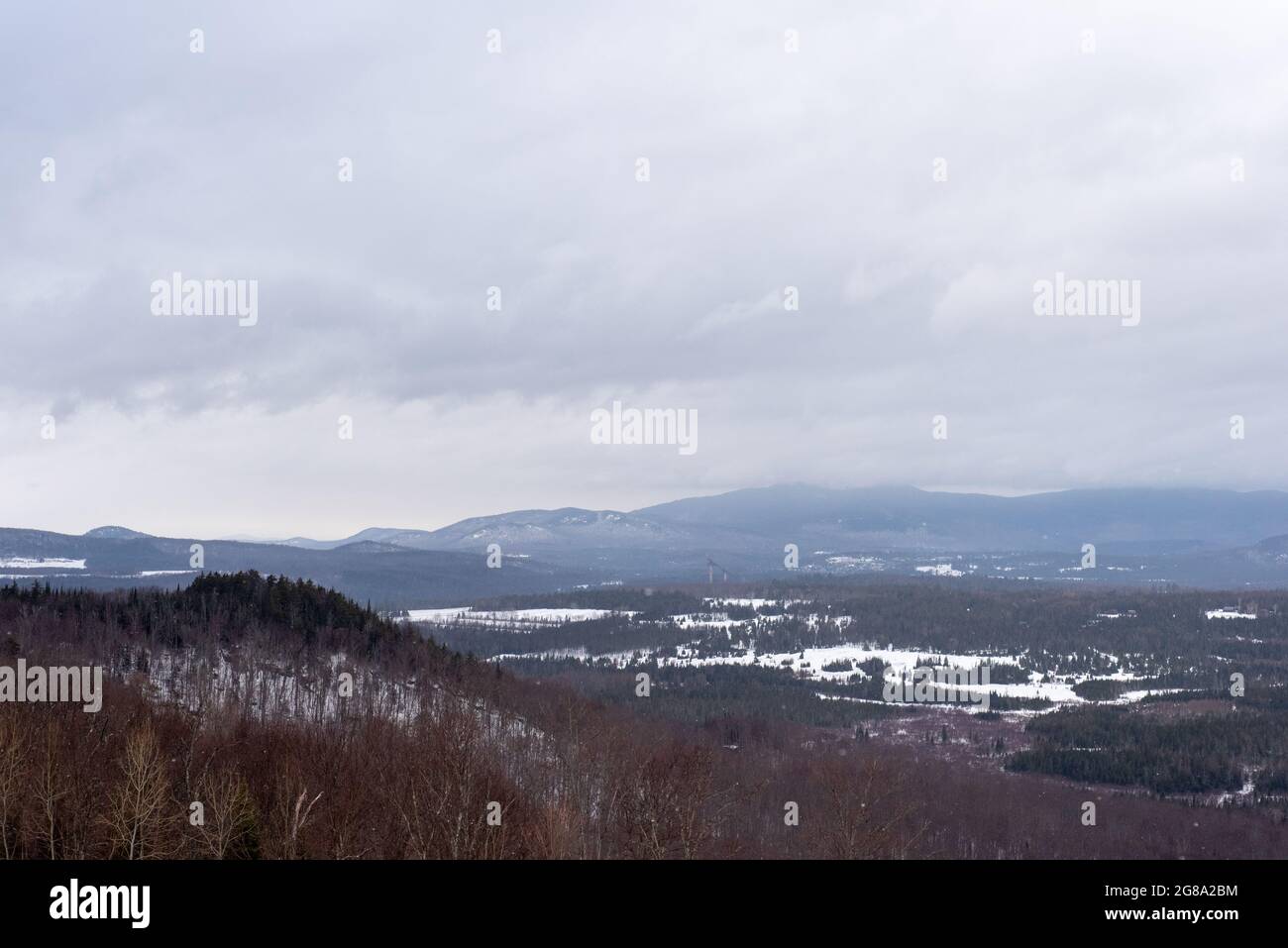Landscape of Lake Placid New York in the winter. Rolling hills ...