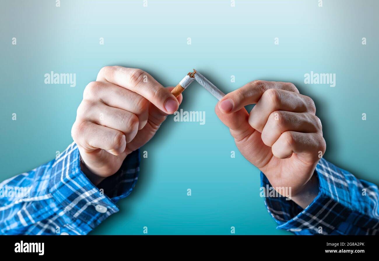 tobacco addiction concept, quit and stop nicotine smoking, hand braking ...