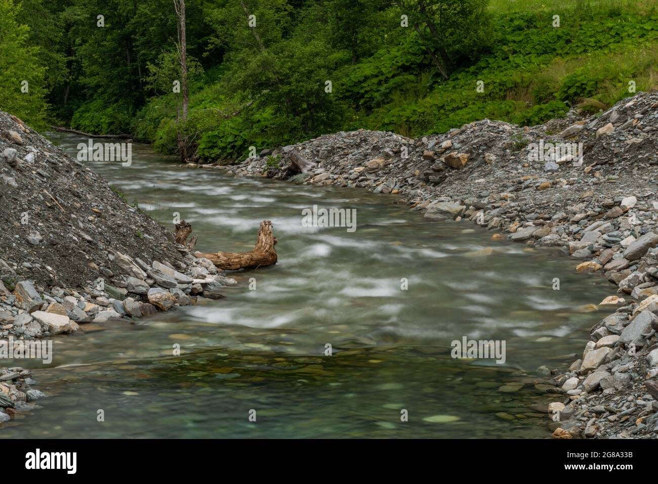 Valley with color small river in Austria Alps mountains near Kree ...