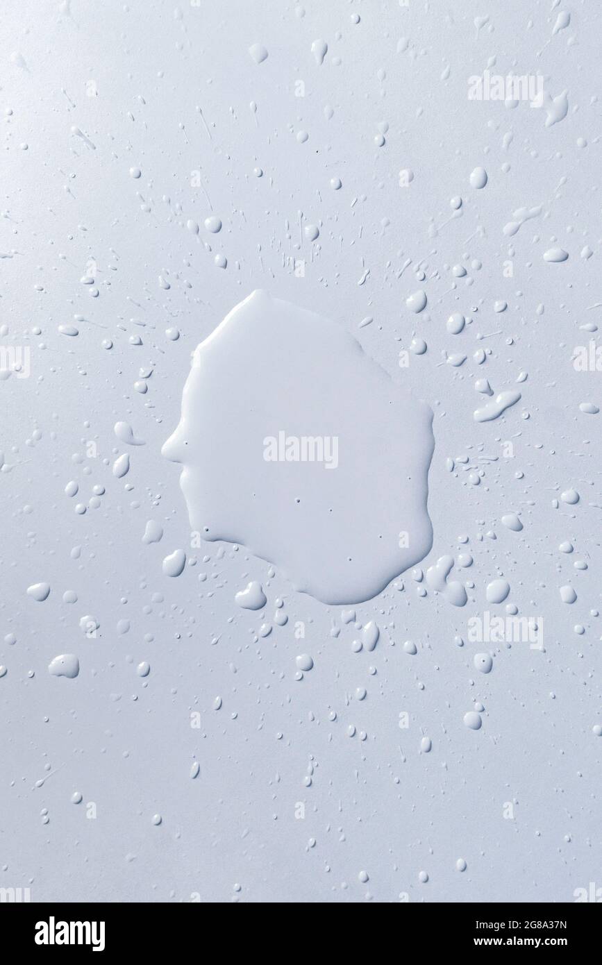 water splash lit on the white table surface, abstract raindrops Stock ...