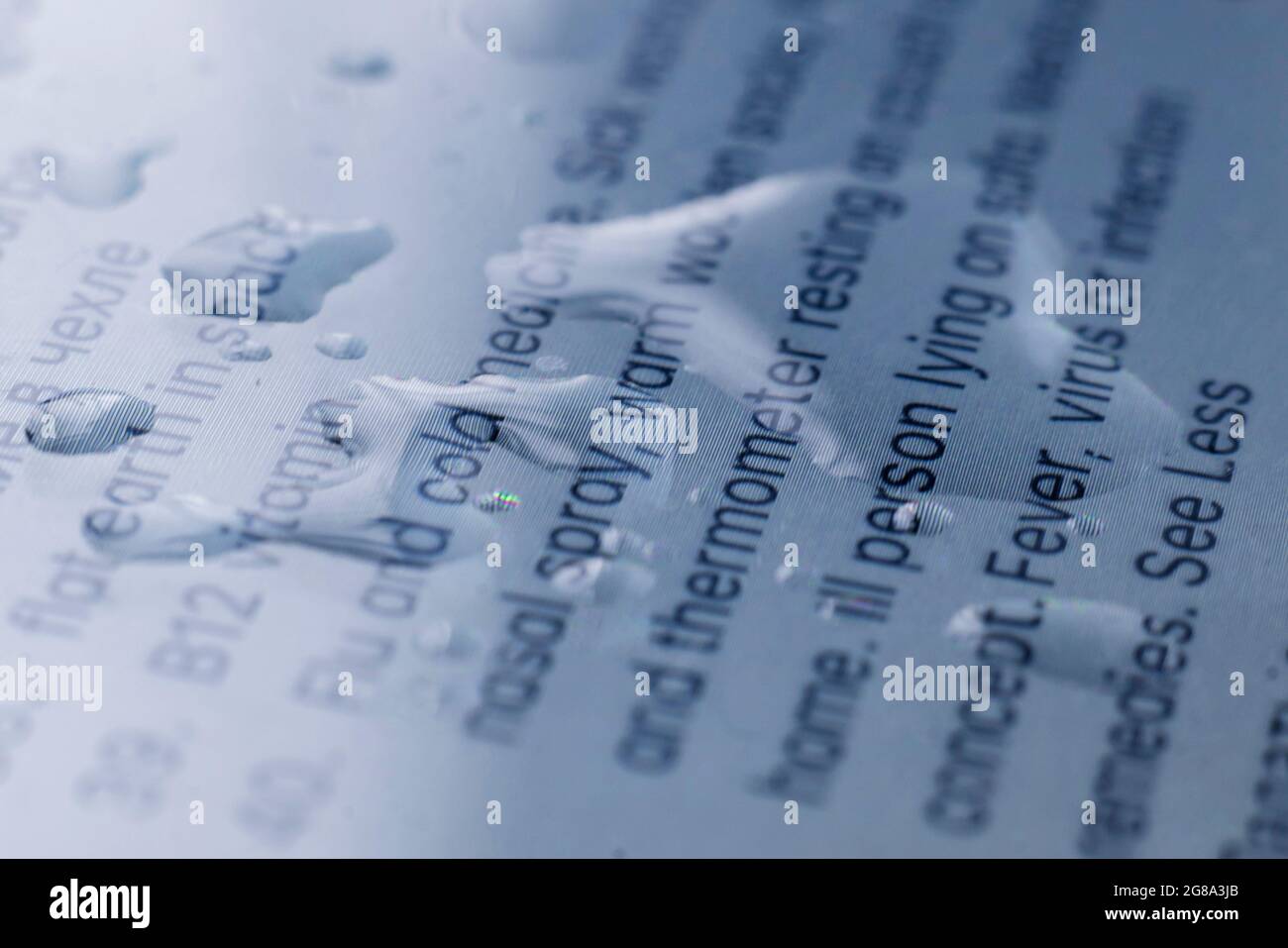 macro view of water bubbles on the pixel screen of the gadget surface ...