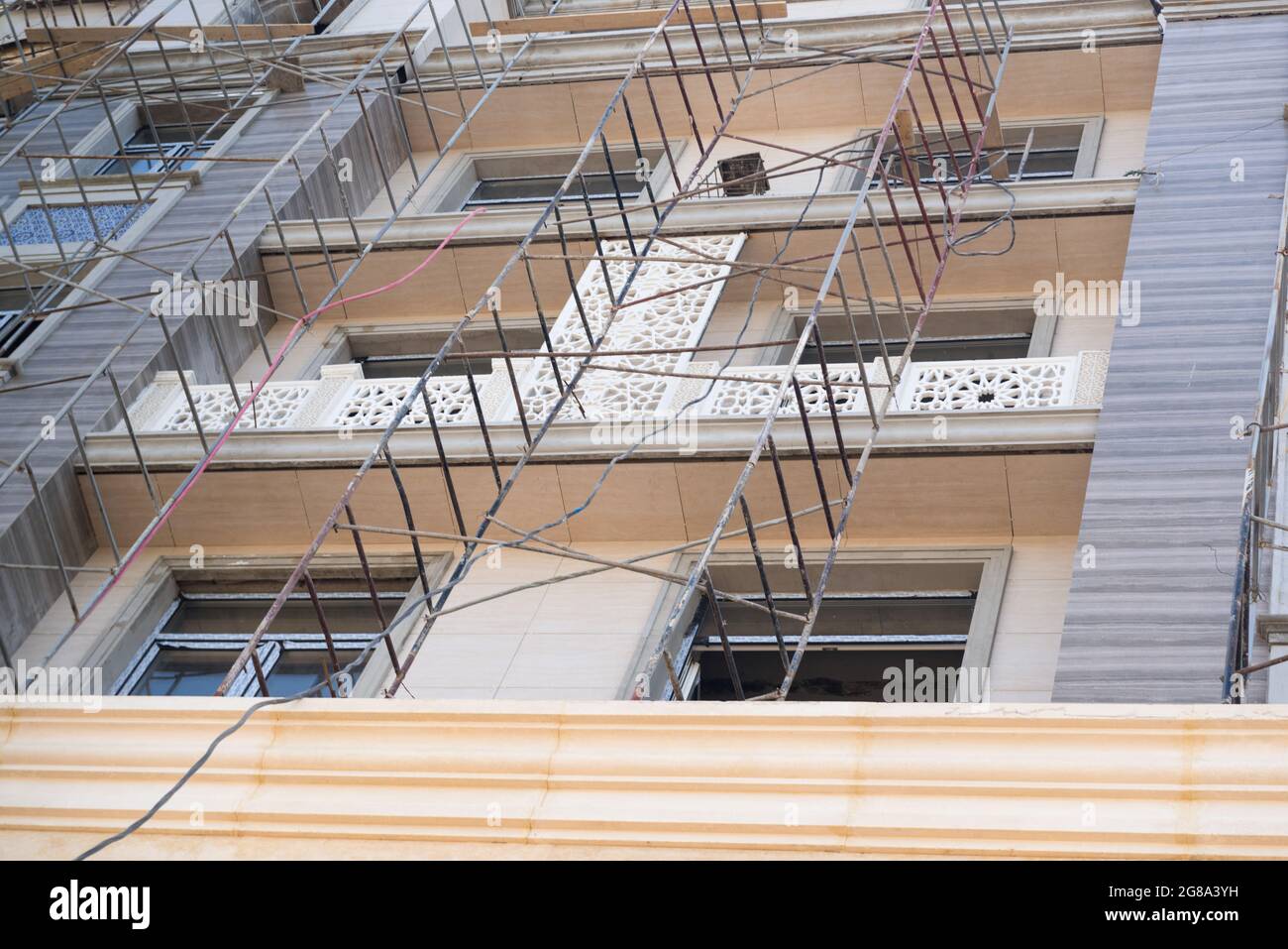 Finishing works on the facade of a new residential buildings Stock ...