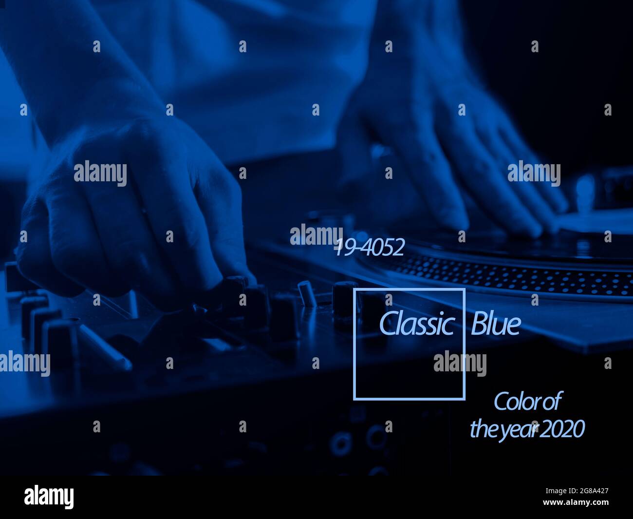 close up young dj playing modern music, color of the 2020 year trend ...