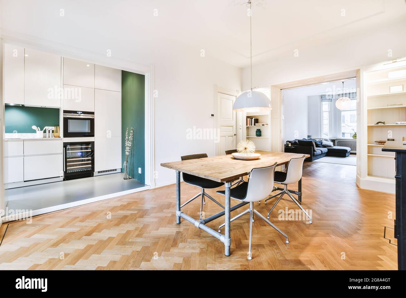 Bright dining room with decorative table and chairs Stock Photo - Alamy