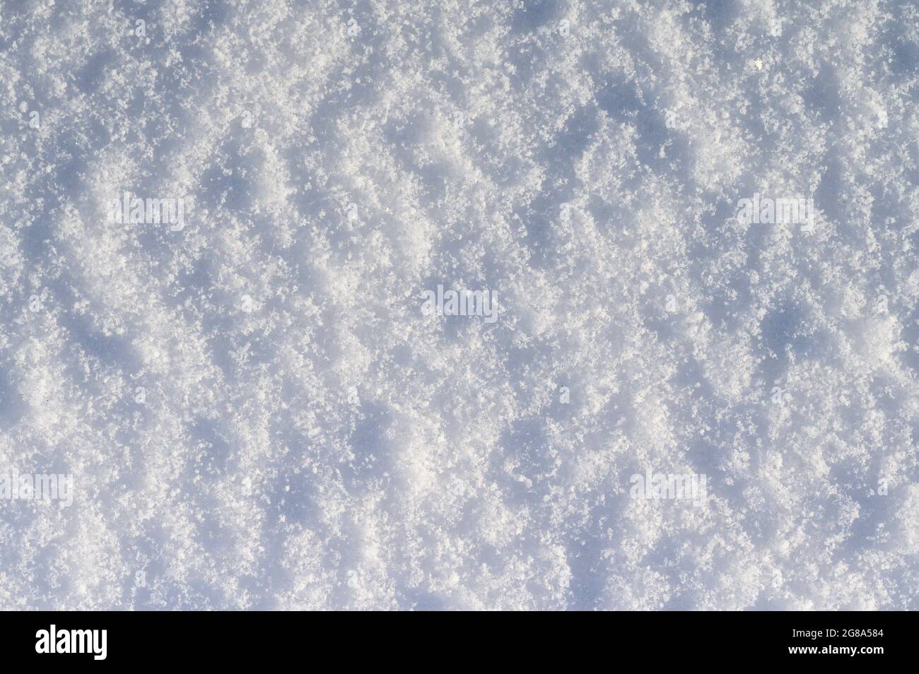 Winter snow background, ice crystals sparkling on snow, christmas ...