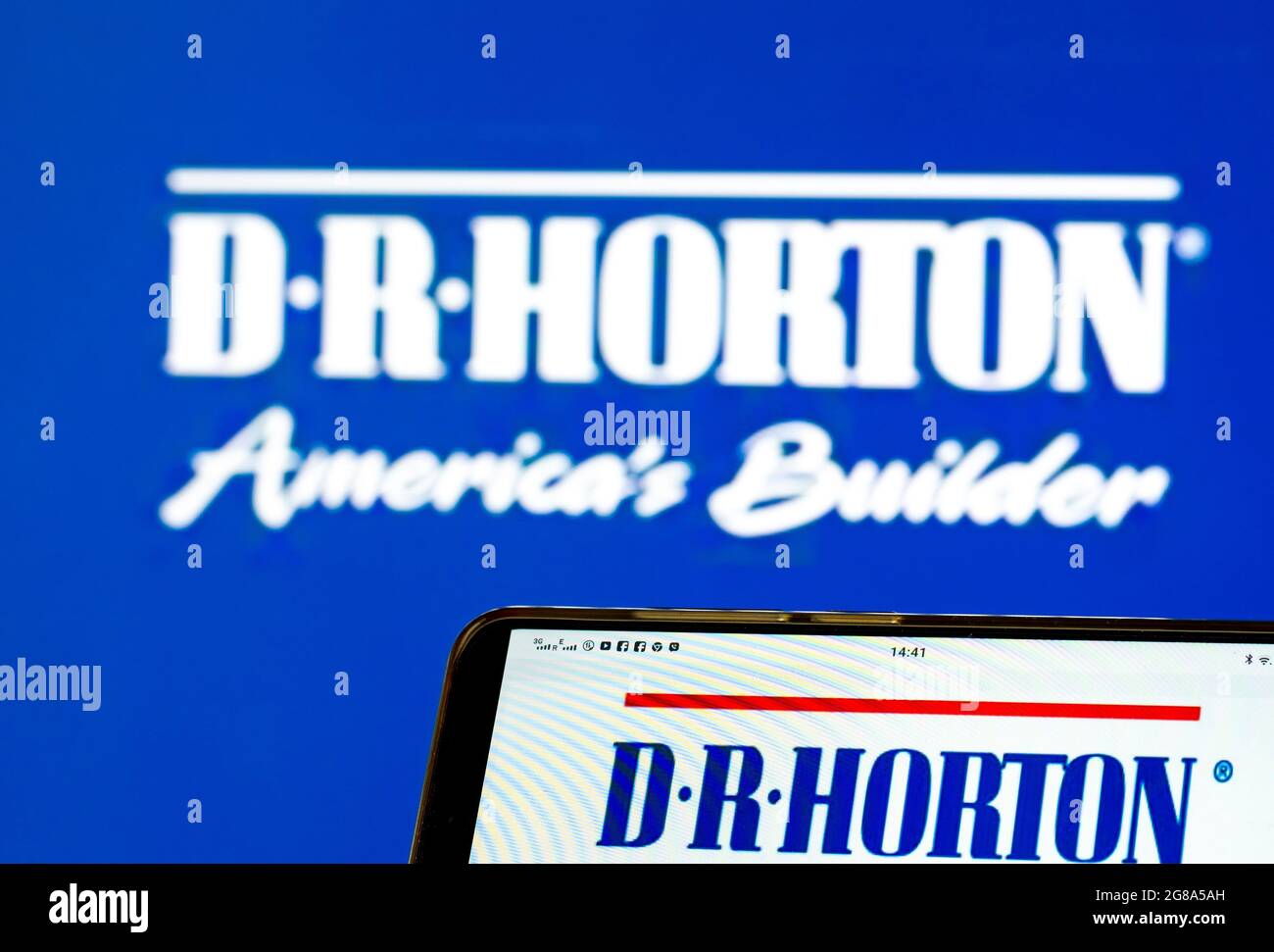 In this photo illustration, a D.R. Horton, Inc. logo seen displayed on ...