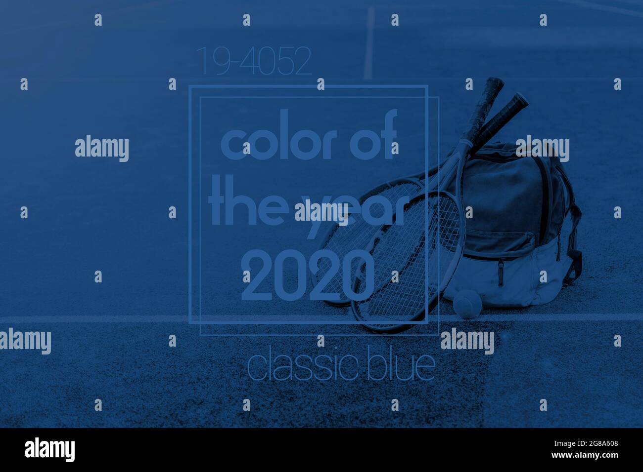 the tennis rackets with a ball near the sport bag with equipment ...