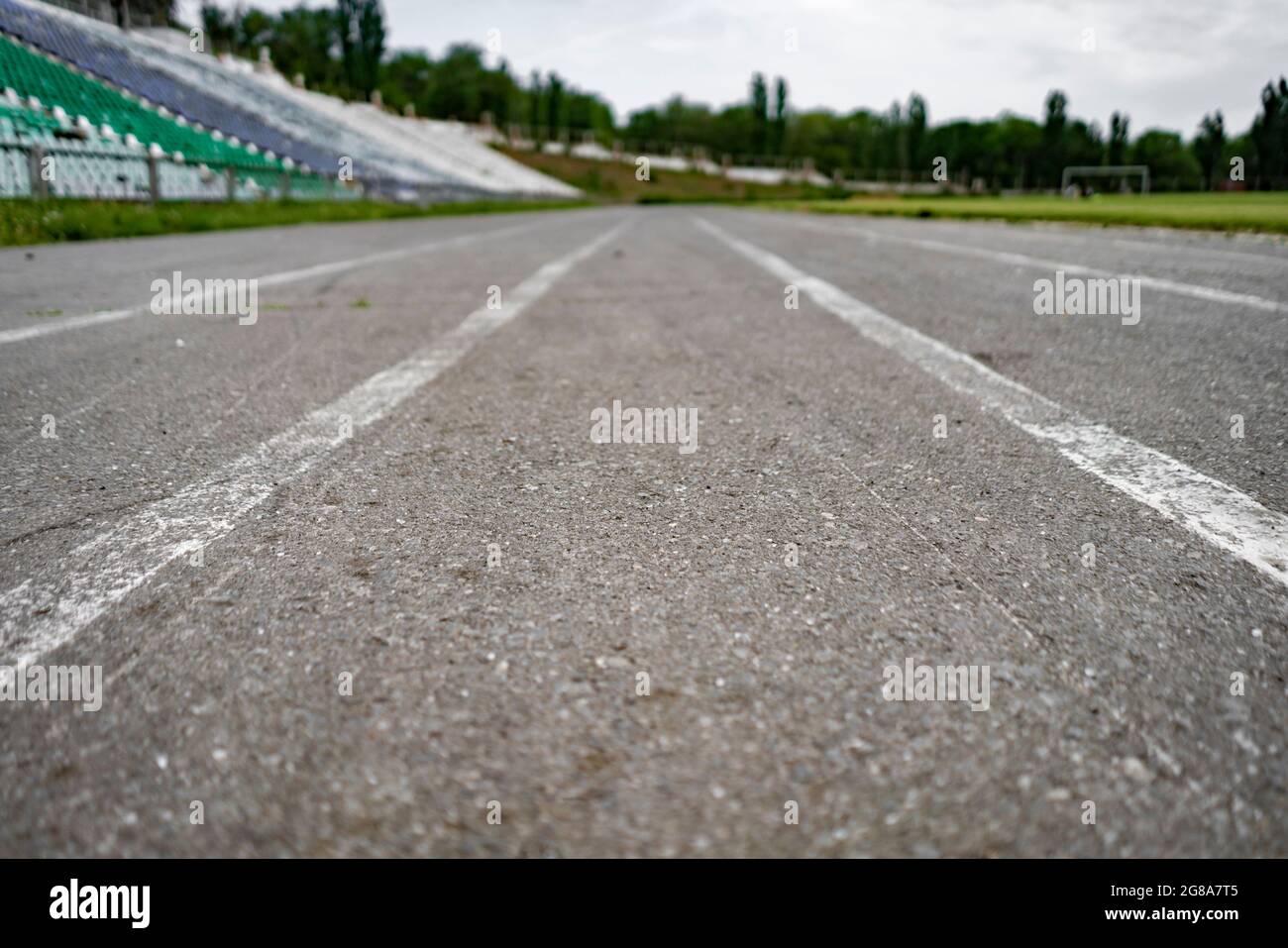 abstract running track asphalt at the stadium background Stock Photo ...