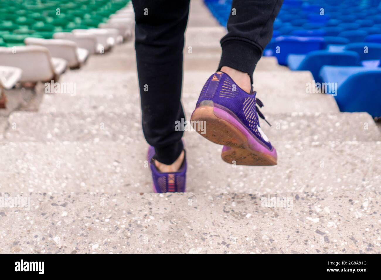 Man run up on stairs hi-res stock photography and images - Alamy