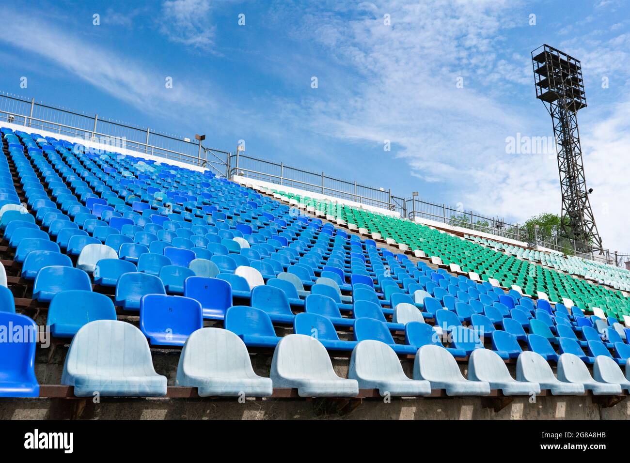 panorama of stadium empty row seats on the open air place before ...