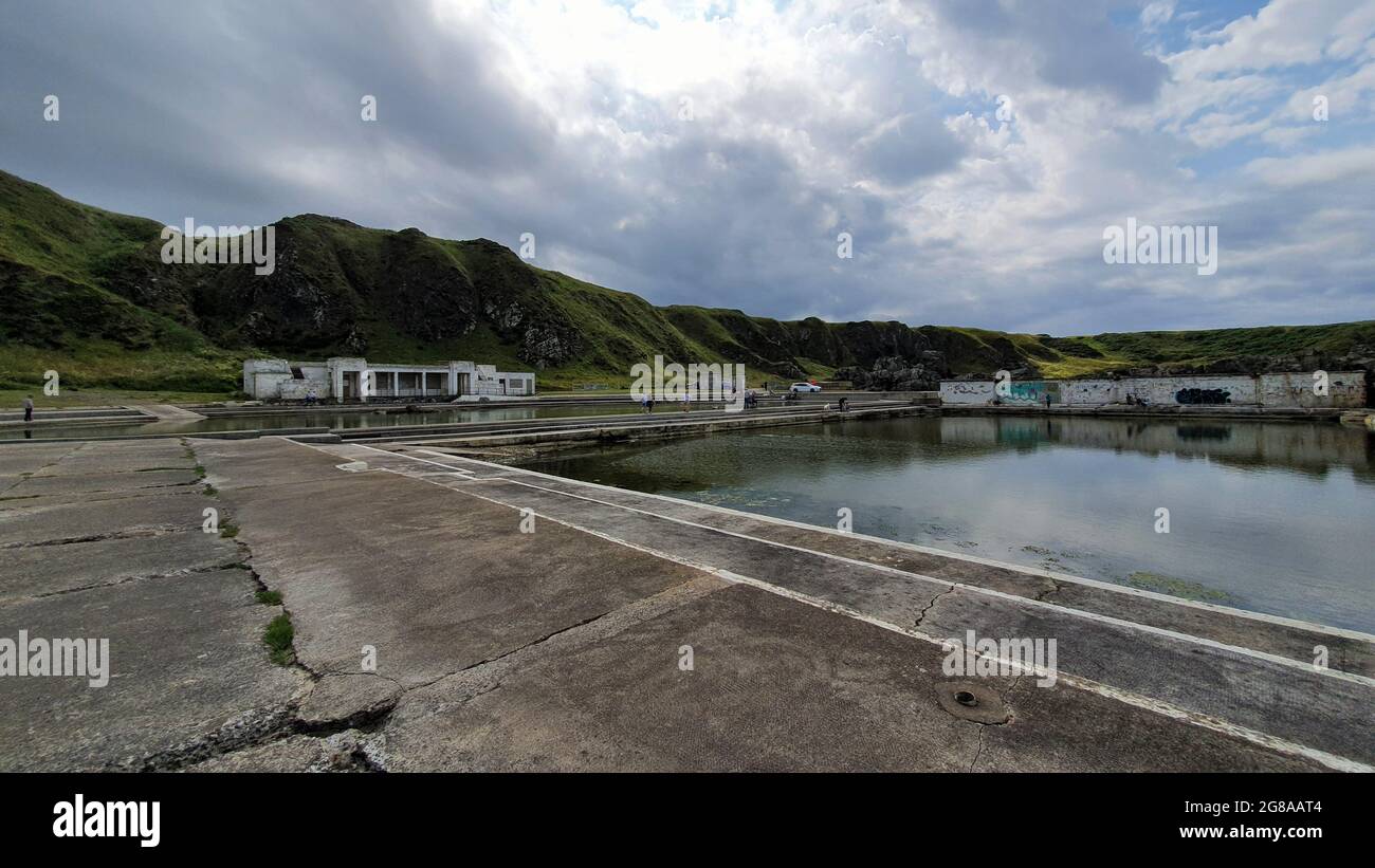 Derelict outdoor swimming pool at Tarlair, Banff, Scotland Stock Photo ...