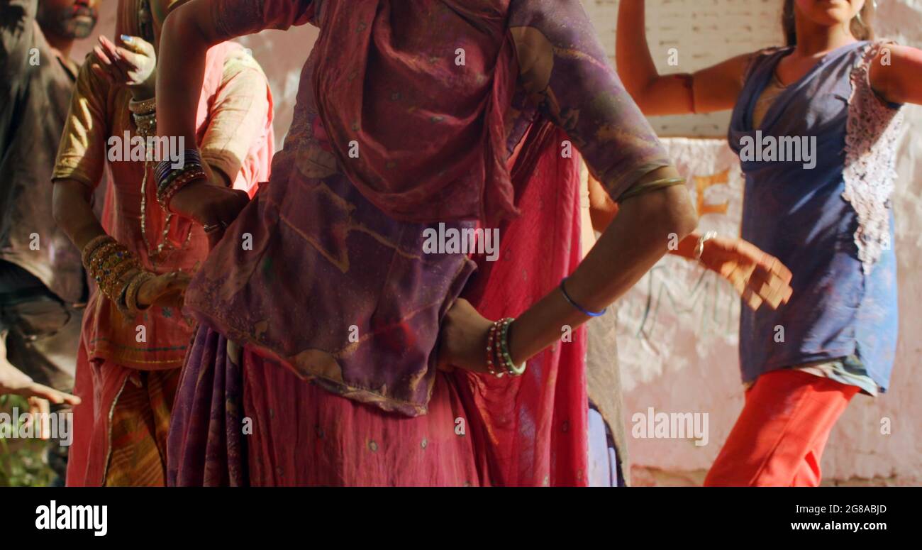 Happy Indians dancing at the Holi festival in India Stock Photo - Alamy