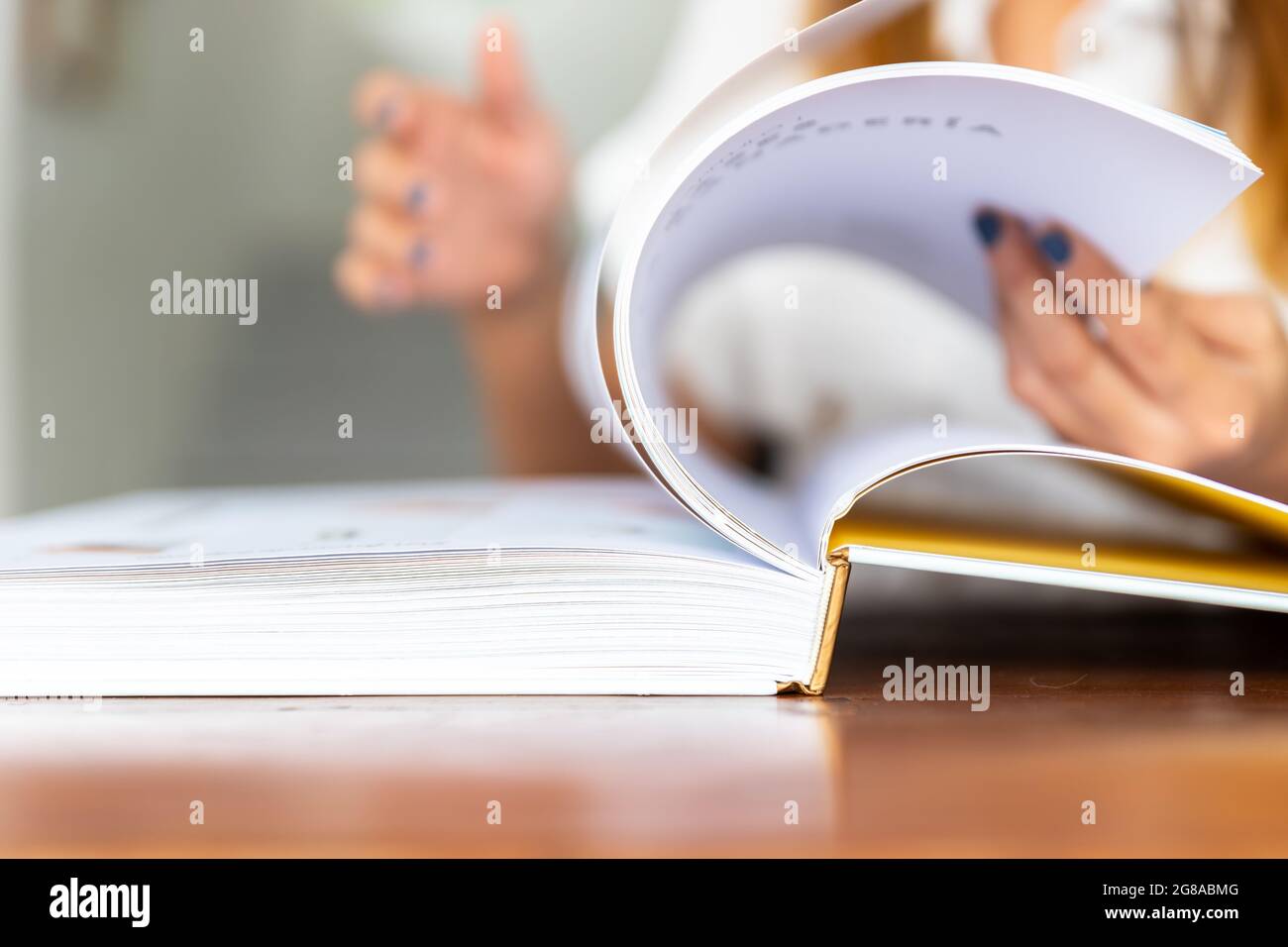 Book pages turning hi-res stock photography and images - Alamy