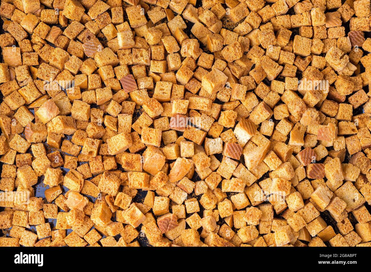 Square-shaped bread crumbs. Oven-fried golden brown bread crumbs ...