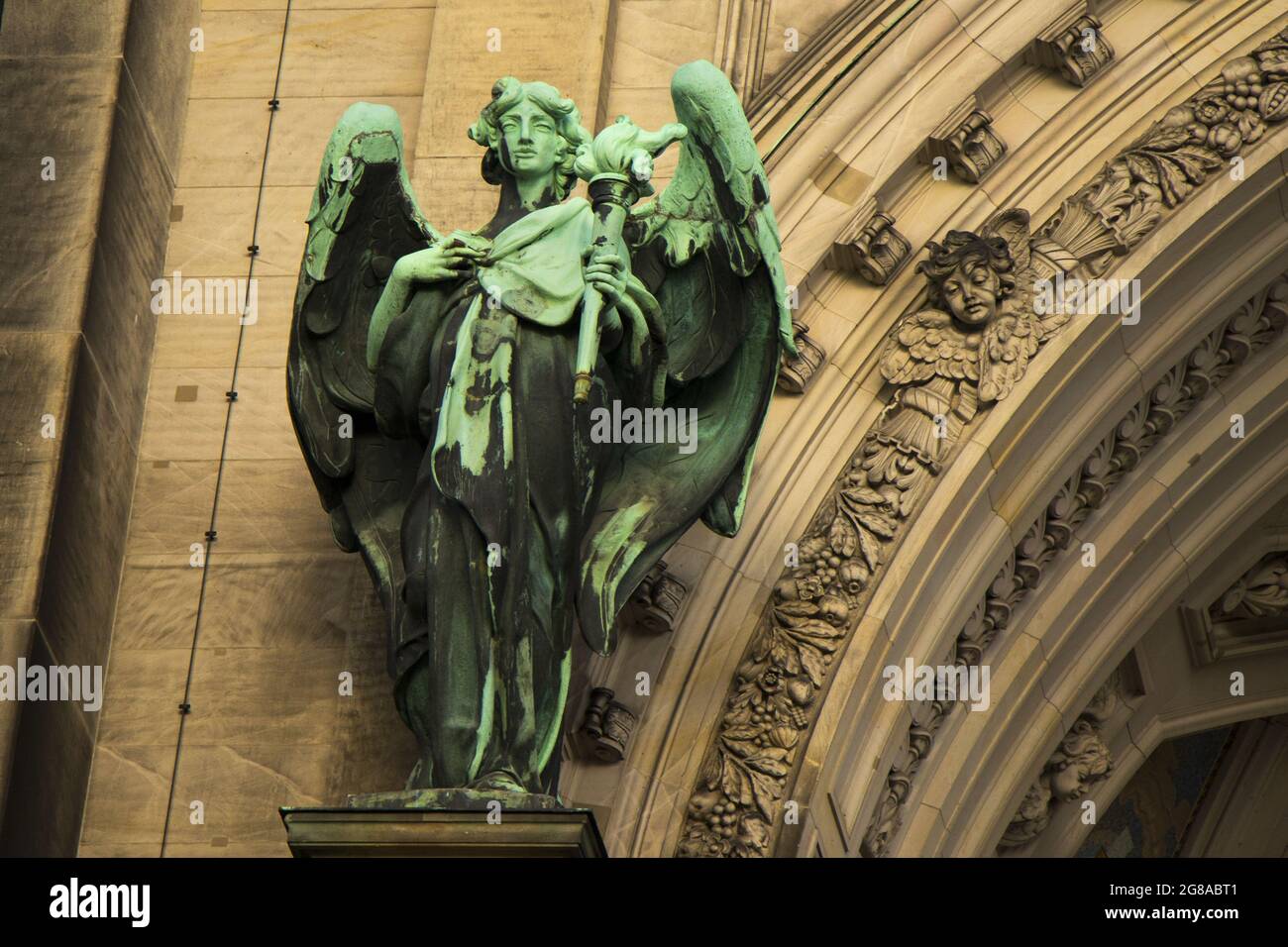 A statue of an angel on Berlin Cathedral in Berlin, Germany Stock Photo ...