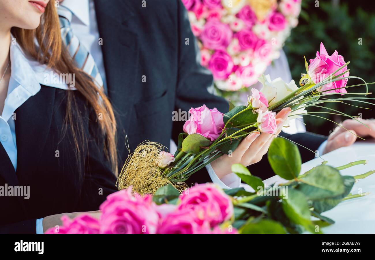 Mourning People at Funeral with coffin Stock Photo - Alamy