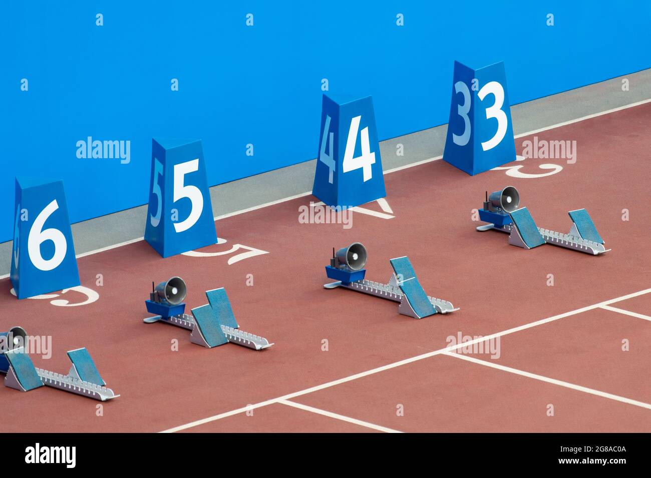 On starting block ready for sprint start. Professional sport concept ...