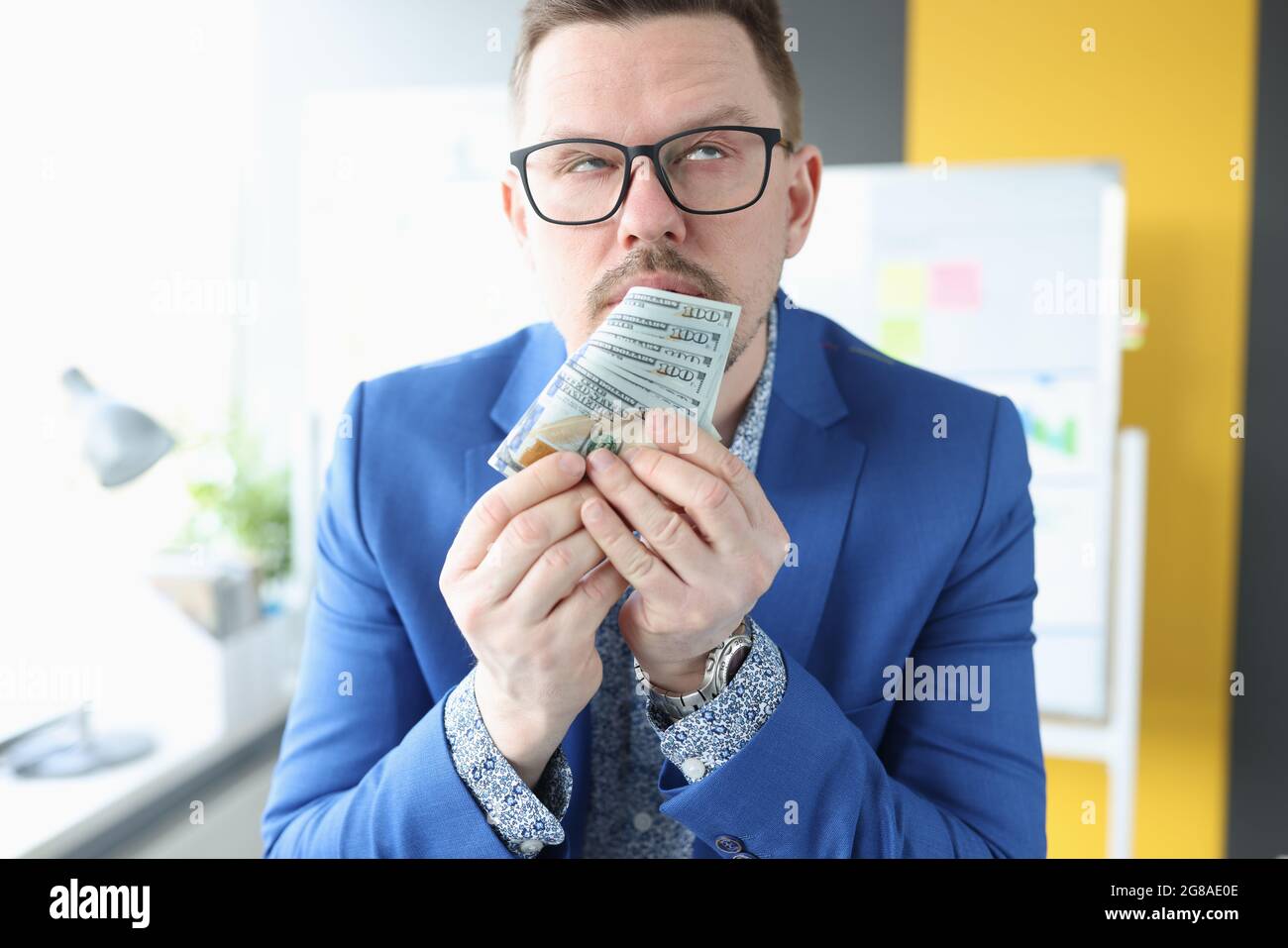 Young man gets cash money hi-res stock photography and images - Alamy