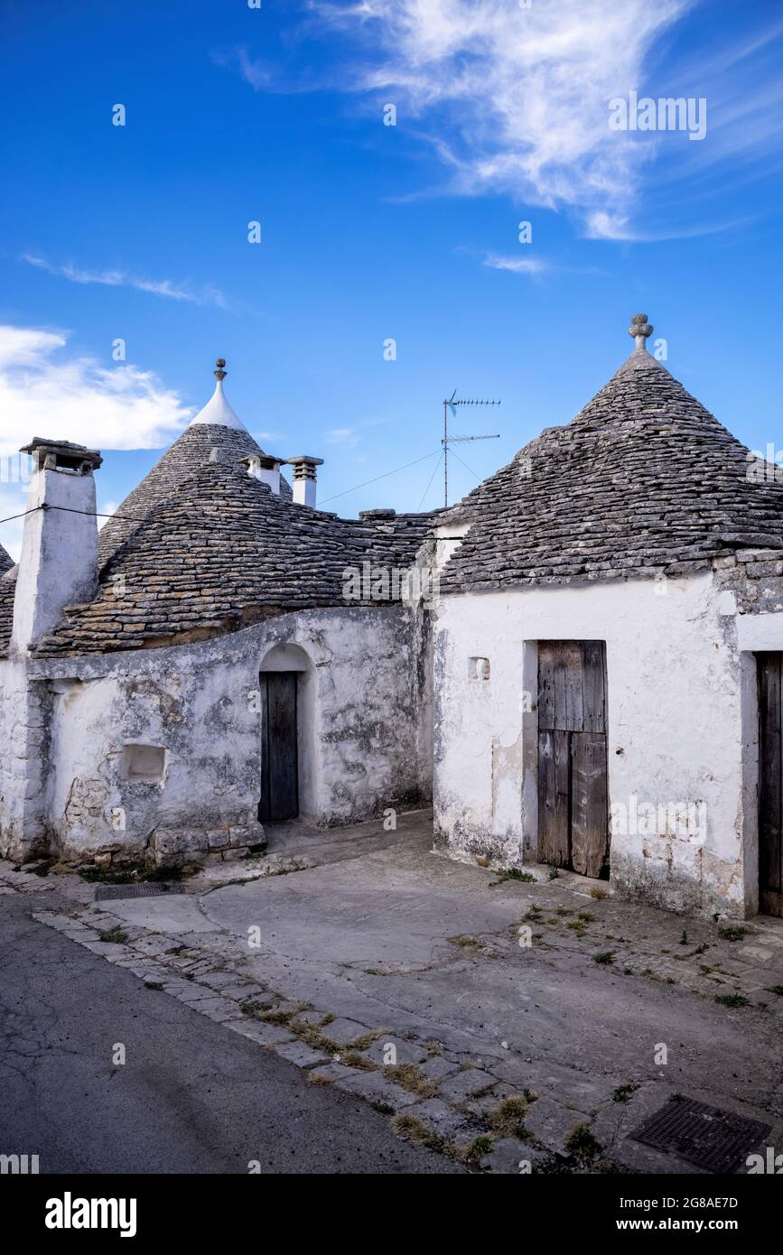 Beautiful town of Alberobello with typical trulli houses built from ...