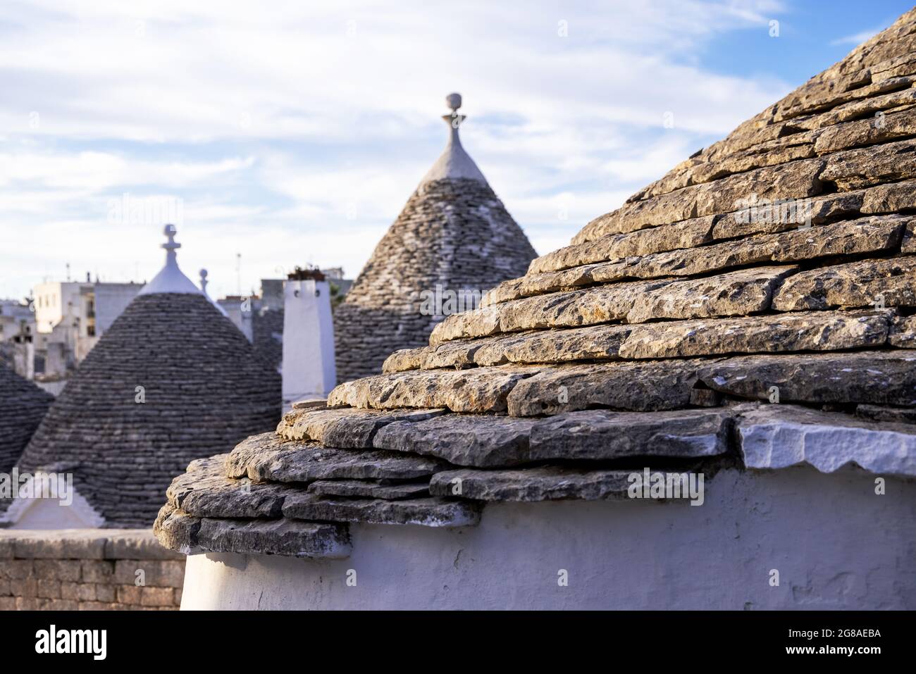 Beautiful town of Alberobello with typical trulli houses built from ...