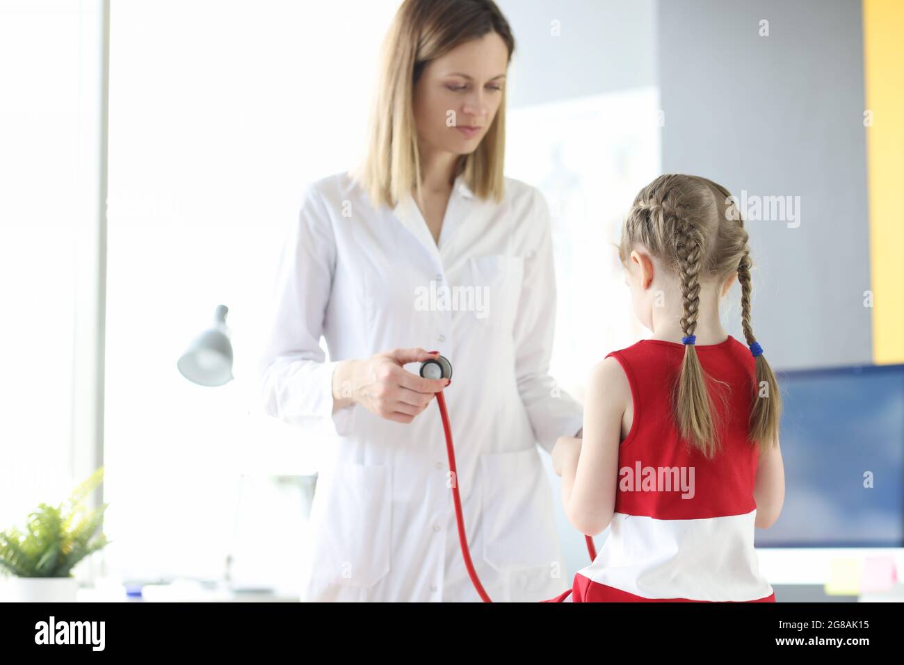Little girl at the pediatrician appointment closeup Stock Photo - Alamy