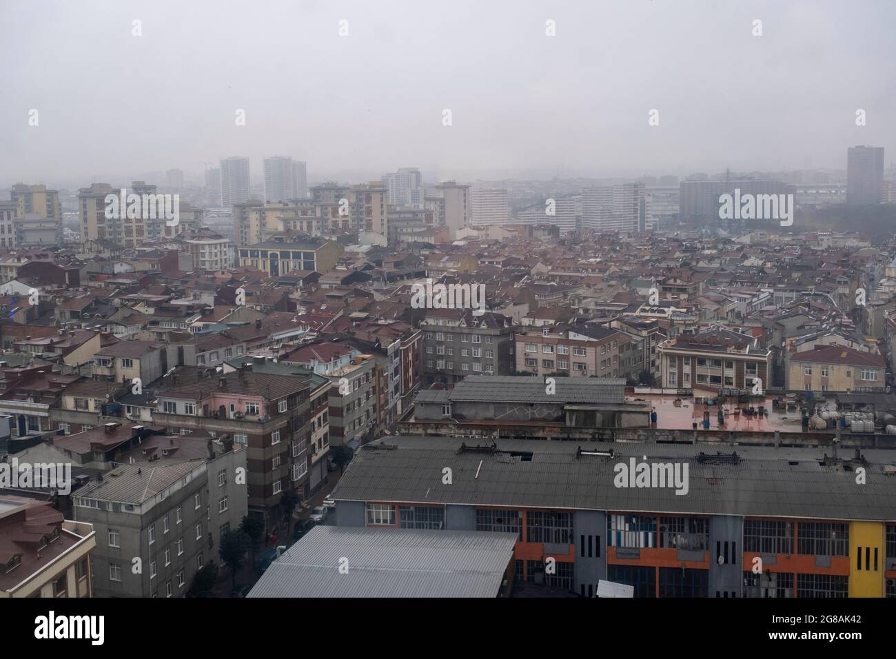 a typical city landscape with factory skyscrapers and a lot of ...