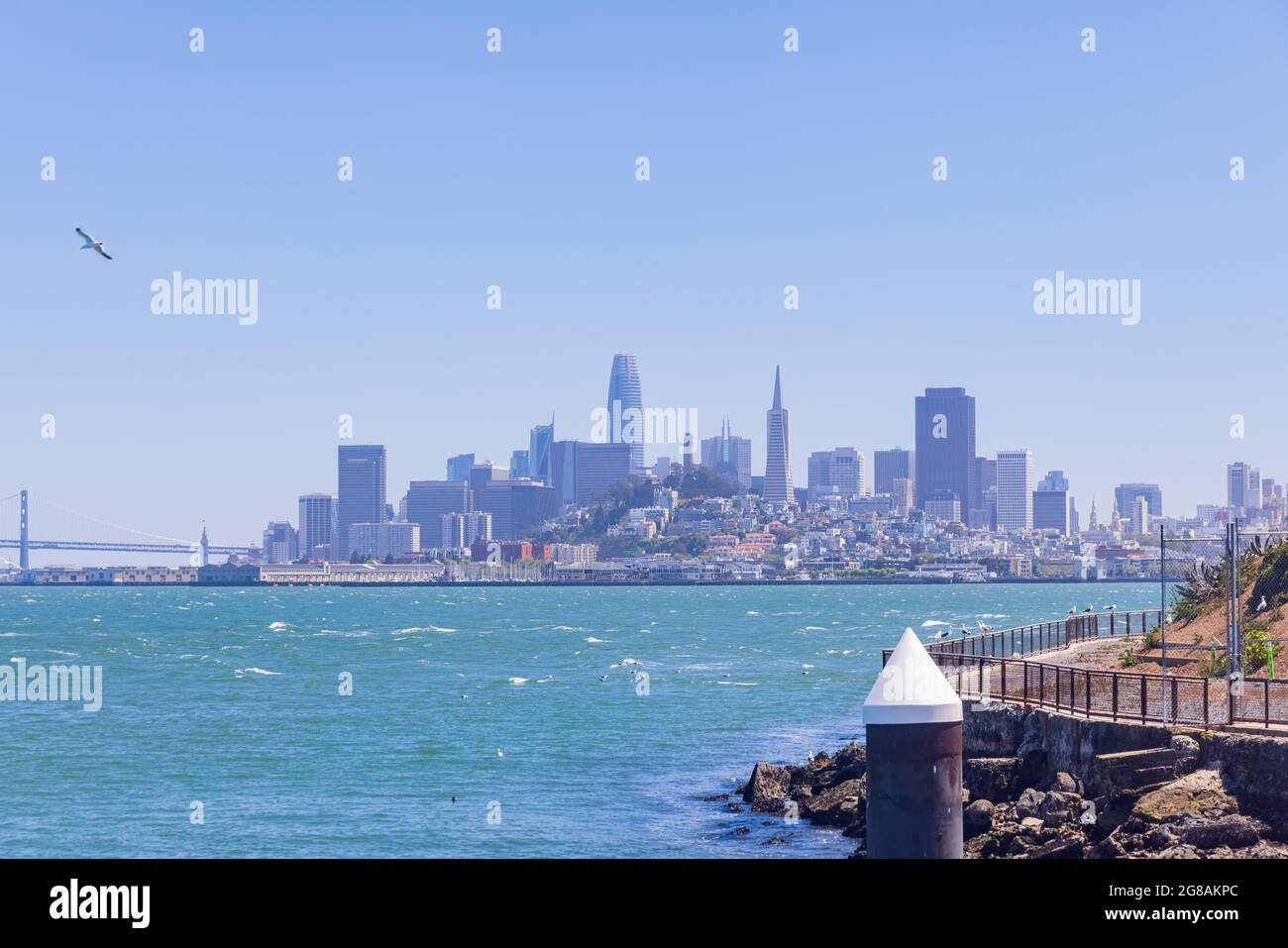 Sunny view of the Alcatraz Island and San Francisco skyline at ...
