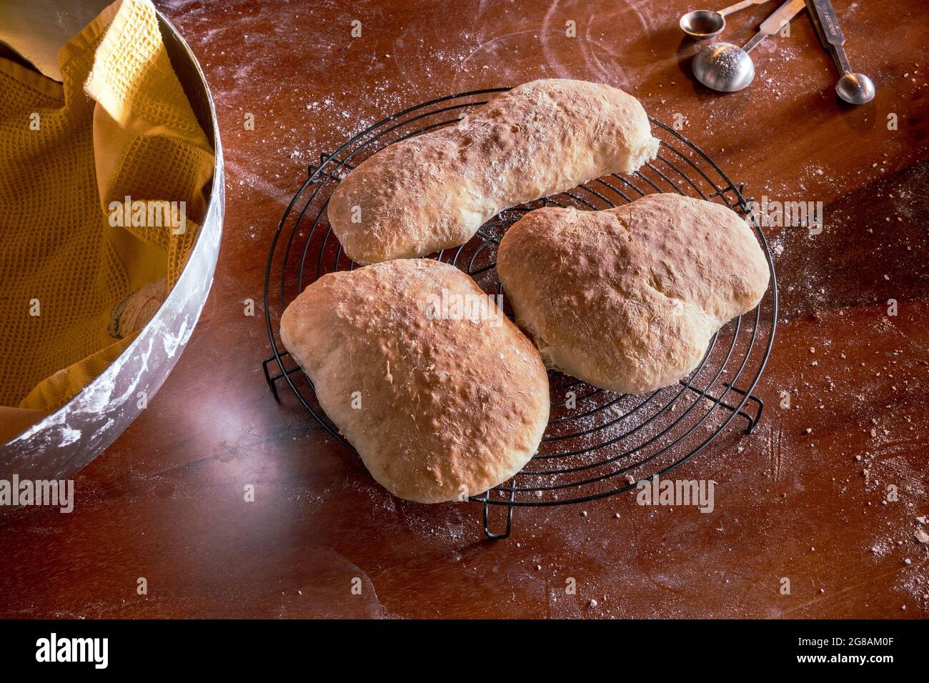 A closeup shot of freshly baked bread loafs on the table Stock Photo ...