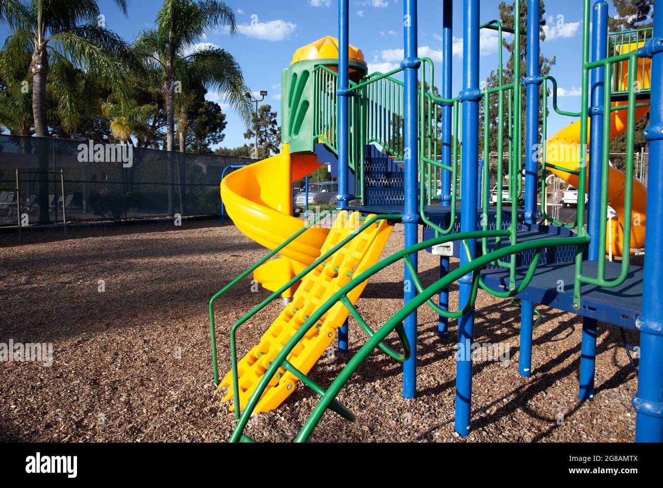 Modern colorful kids playground - swings, slides, steps and ladders ...