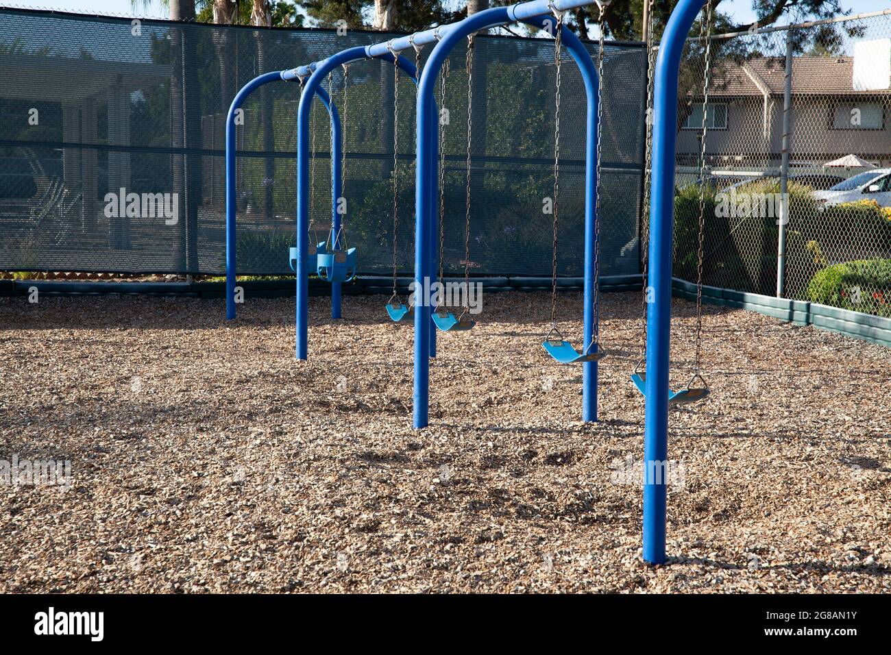 Modern colorful kids playground - swings, slides, steps and ladders ...