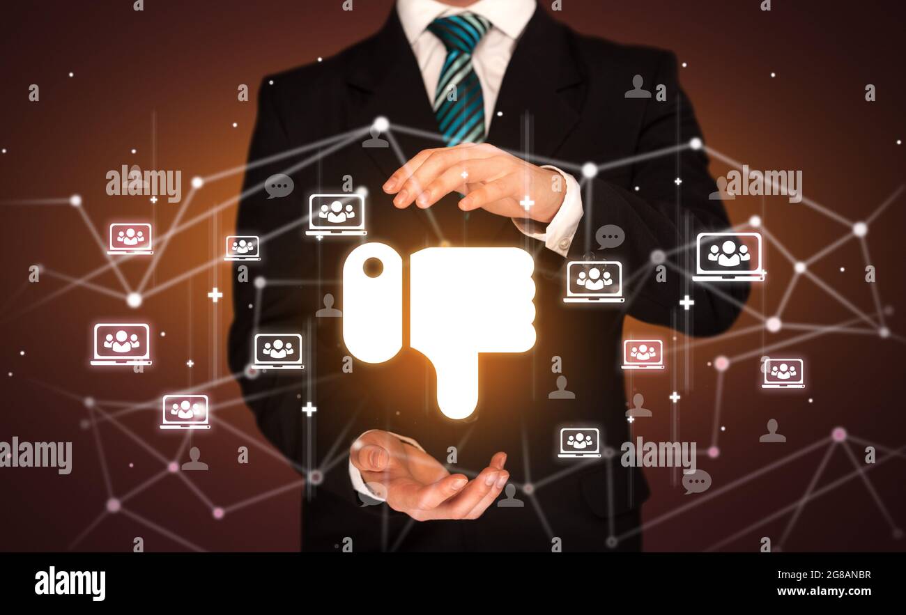 Hand holding social media icons Stock Photo - Alamy