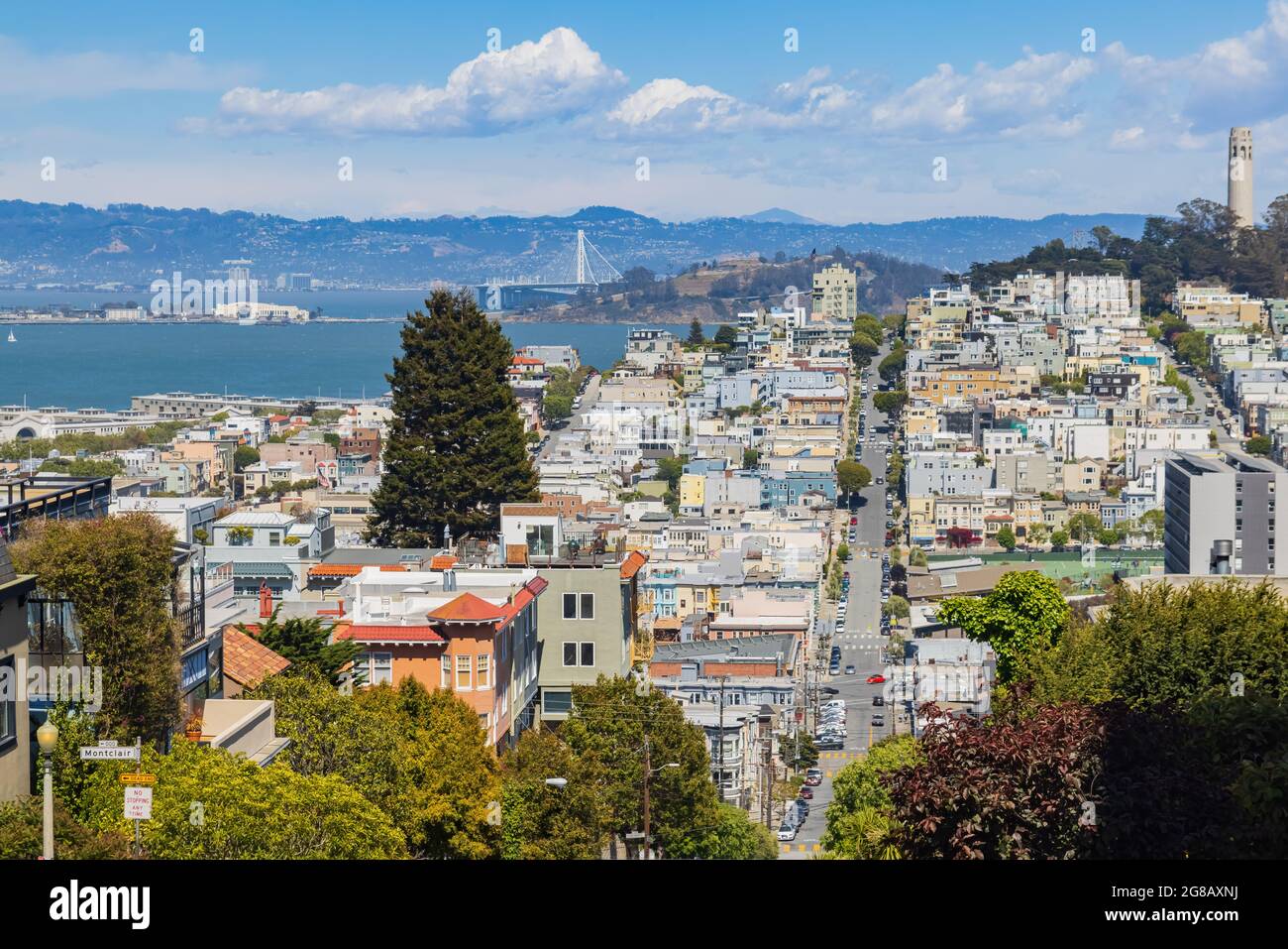 Sunny view of the Coit Tower and cityscape at San Francisco, California ...
