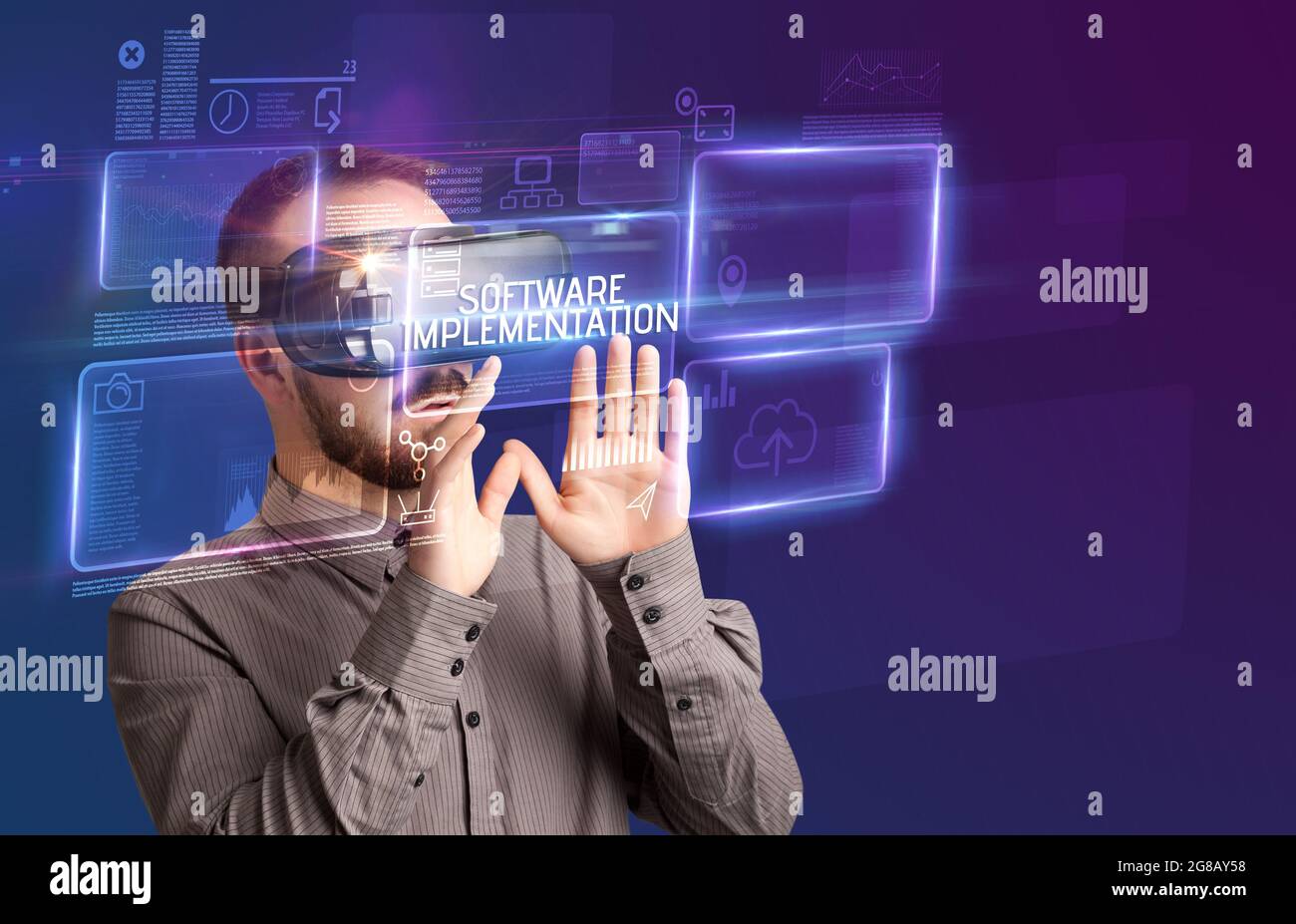 Businessman looking through Virtual Reality glasses, tech concept Stock ...