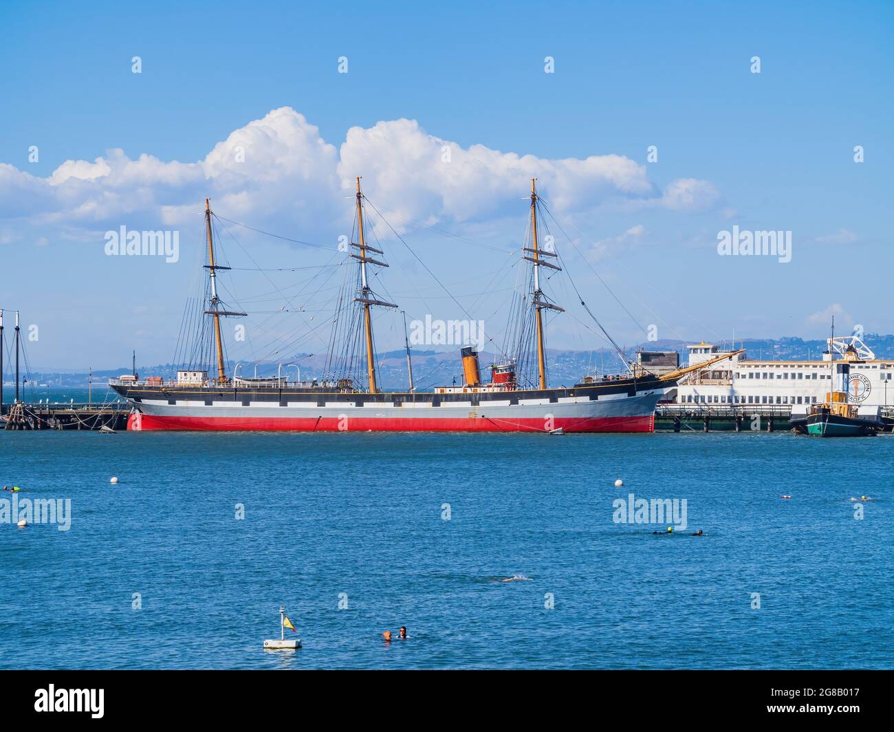 Red vessel ship parked at the pier at San Francisco, California Stock ...