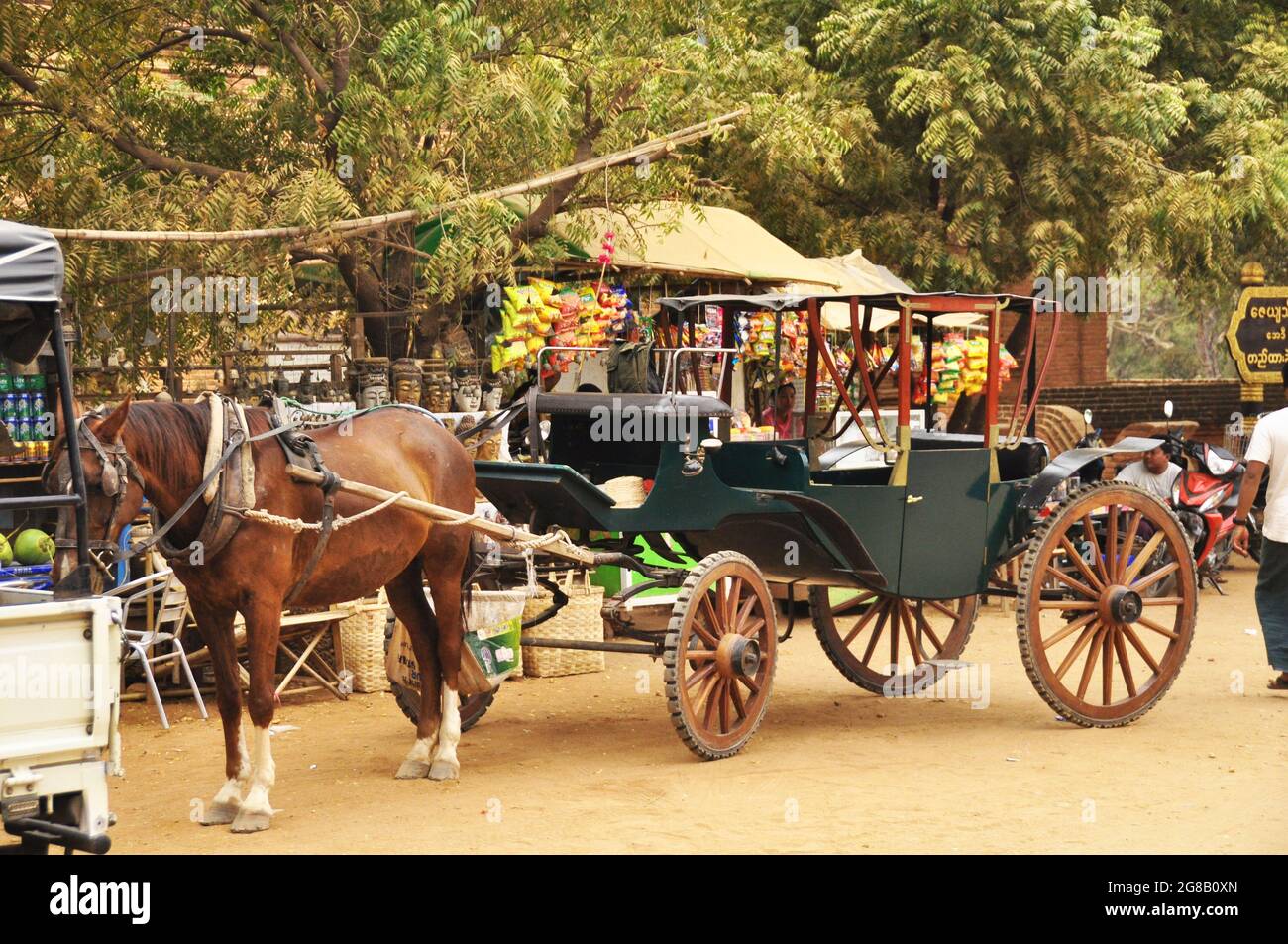 Burmese sit ride horse drawn carriages and waiting for burma people and ...