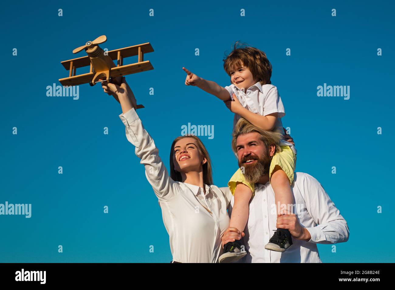 Happy family outdoors. Father mother and son enjoy life. Parent and ...