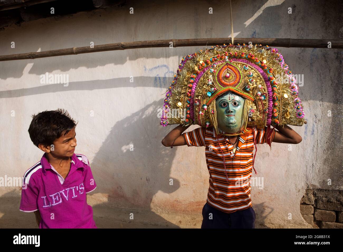 Chou dancers preparing for chou dance, a folk dance of India, where ...