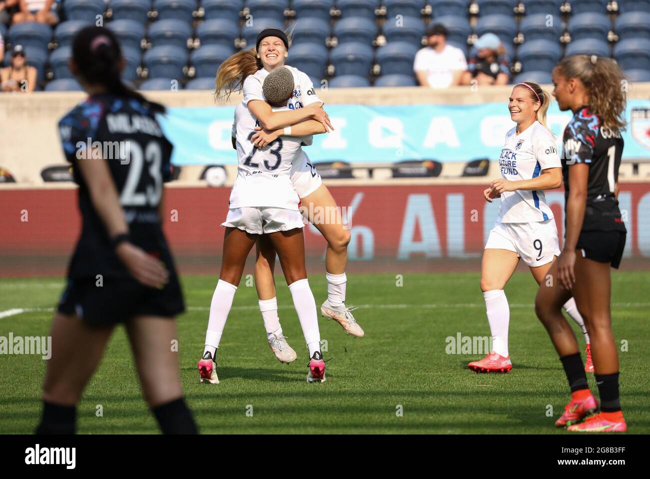 OL Reign forward Bethany Balcer (24) celebrates scoring a goal with ...