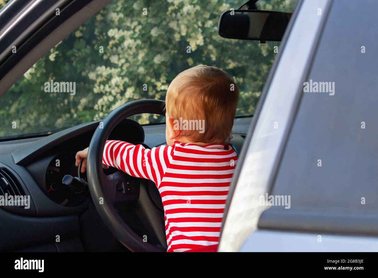 Baby boy driver. Travel with kids concept Stock Photo - Alamy