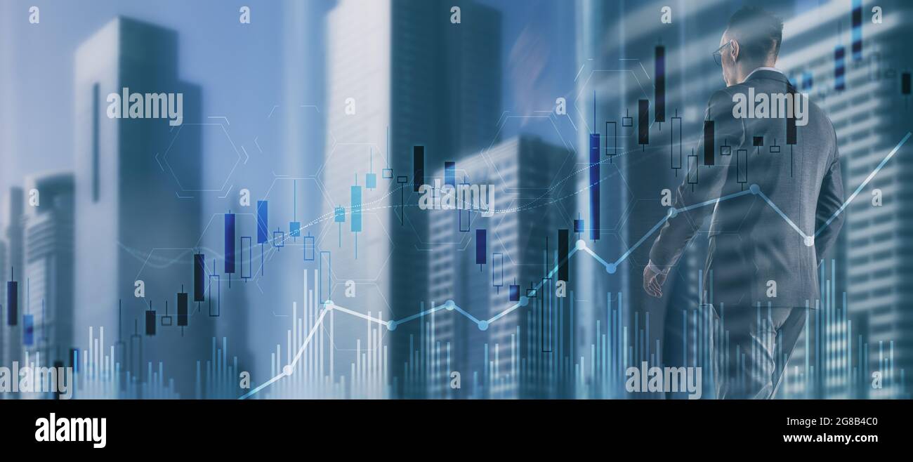 Trading candlestick chart and diagrams on blurred office center ...